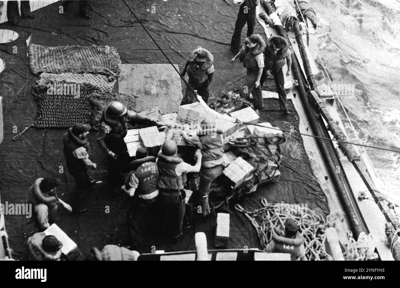Cargo net aboard USS Worcester (CL-144) during an underway ...