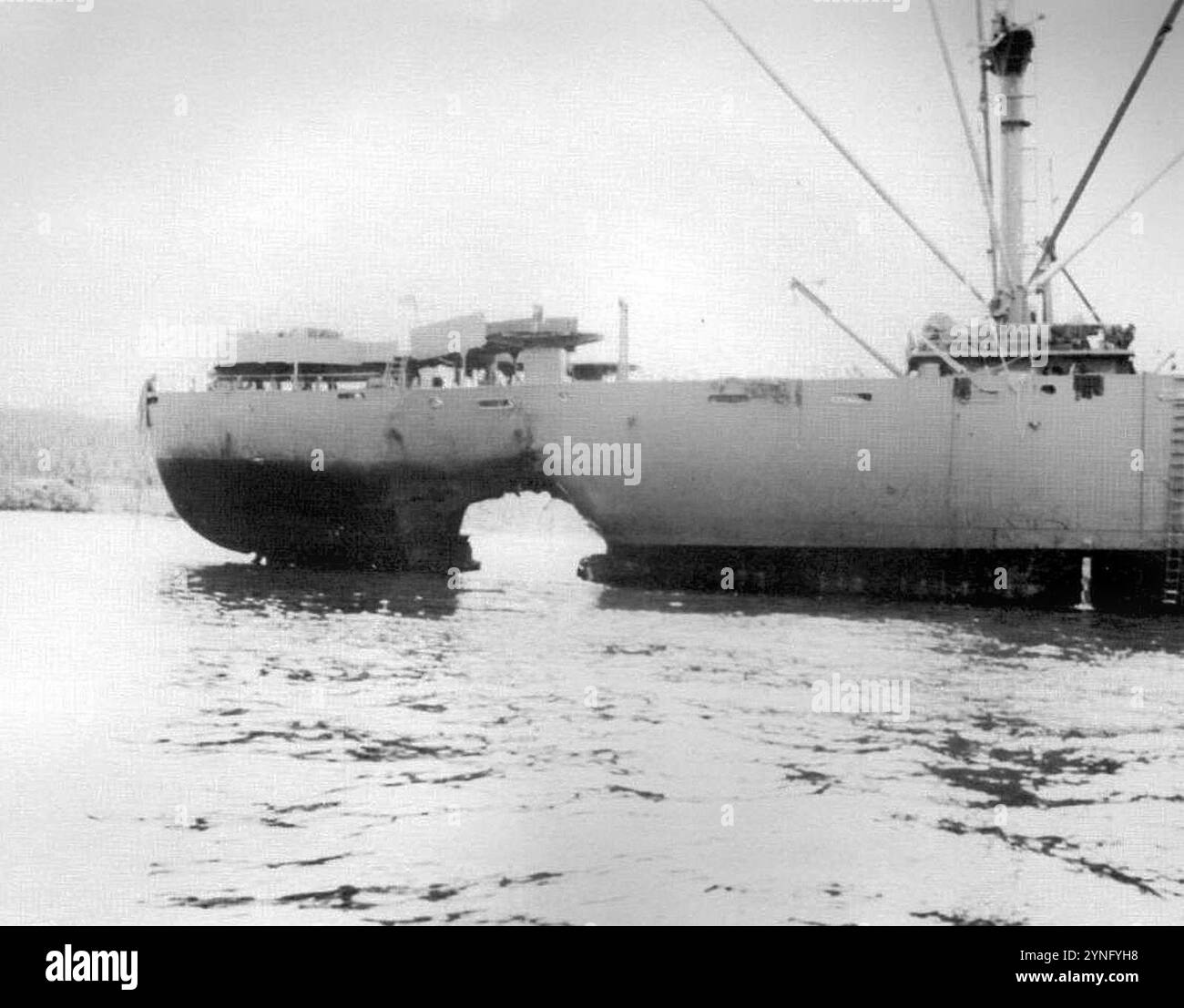 Cargo ship USS Alhena (AK-26) 1942 torpedo damage Stock Photo - Alamy