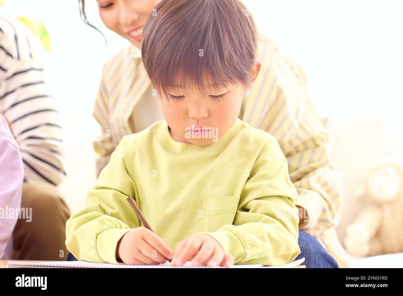 Japanese kid drawing at home Stock Photo - Alamy