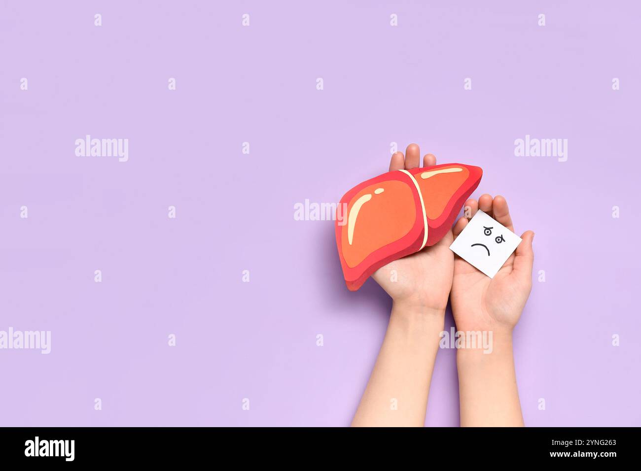 Female hands with paper liver and sad smile on lilac background Stock ...