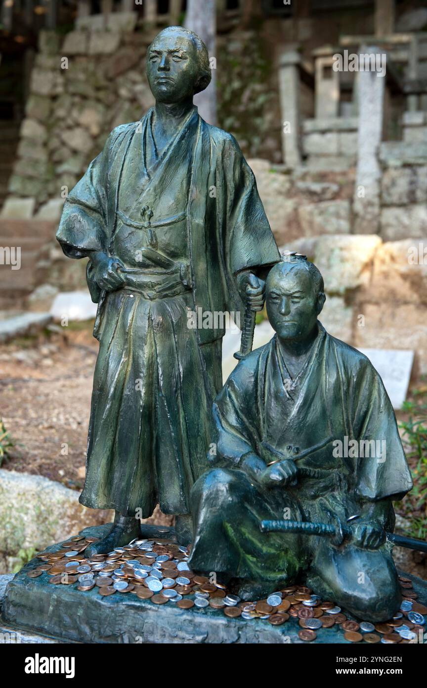 Bronze statues of famous samurai Sakamoto Ryoma and Nakaoka Shintaro in Ryozen cemetery near ...