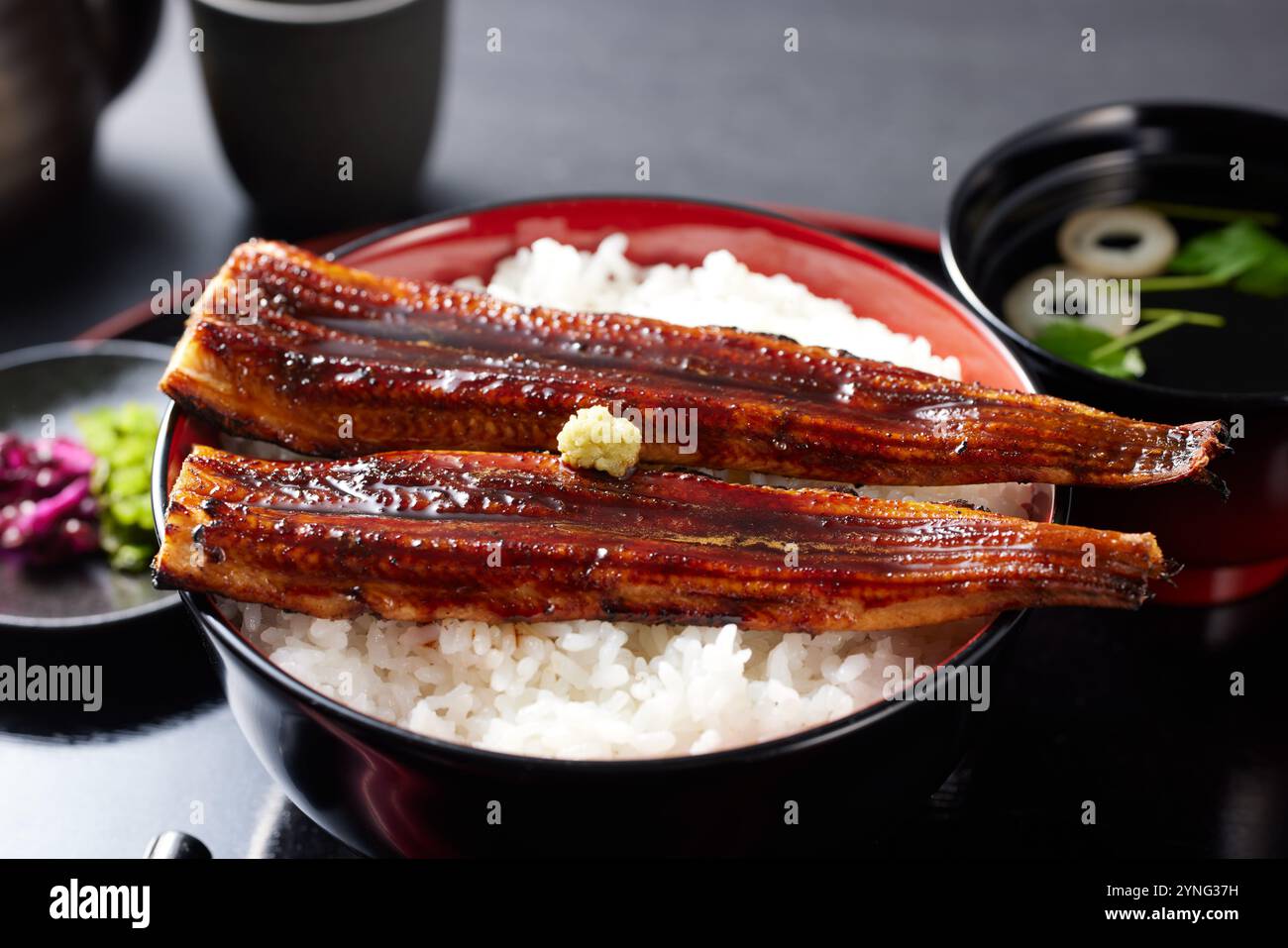 Japanese style unagi eel bowl Stock Photo - Alamy