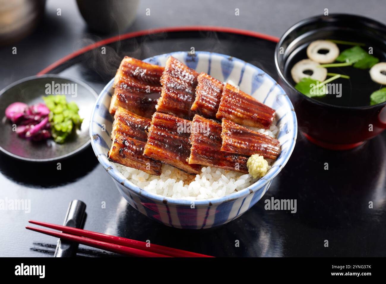 Japanese style unagi eel bowl Stock Photo - Alamy