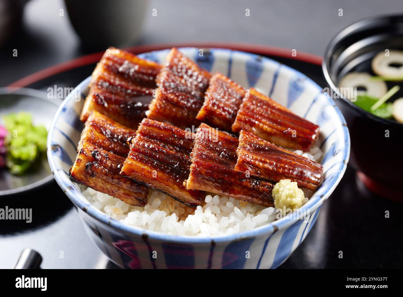 Japanese style unagi eel bowl Stock Photo - Alamy