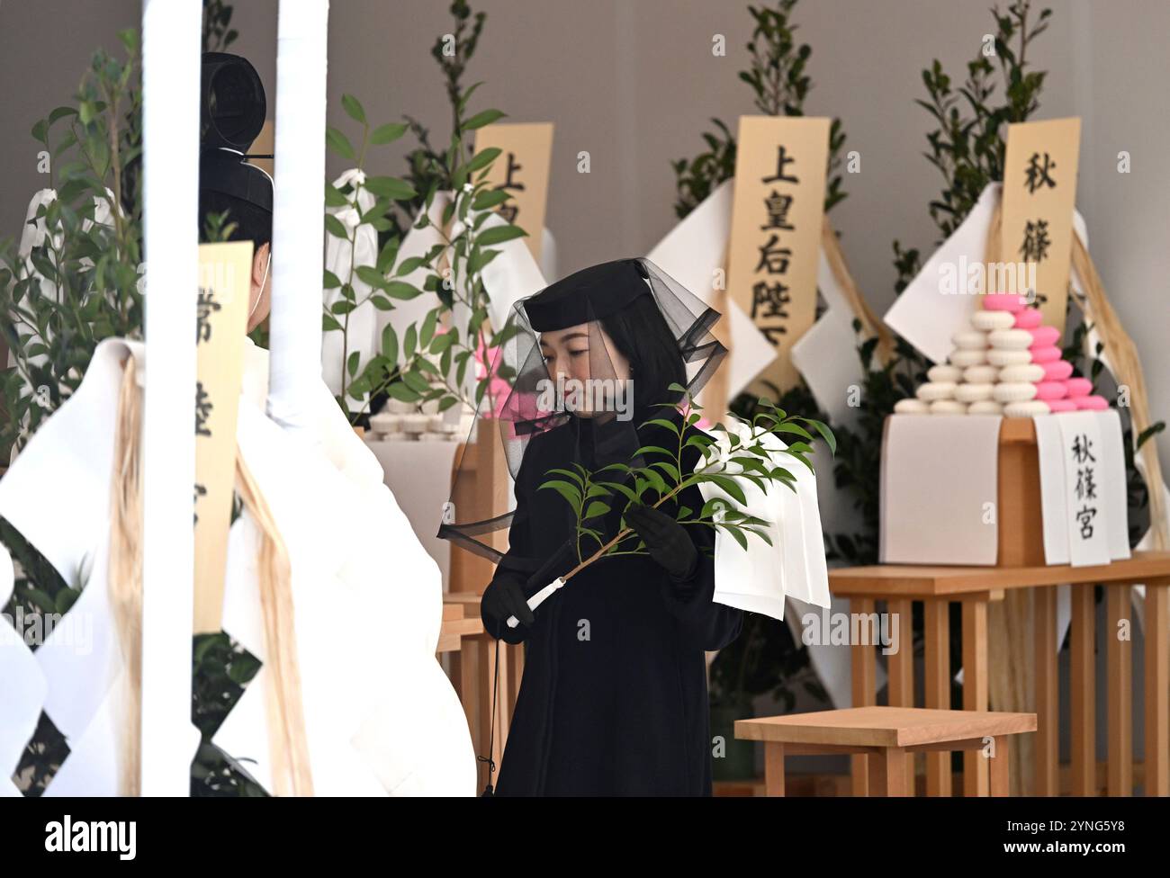Japanese Princess Akiko Mikasa serves as chief mourner during the ...