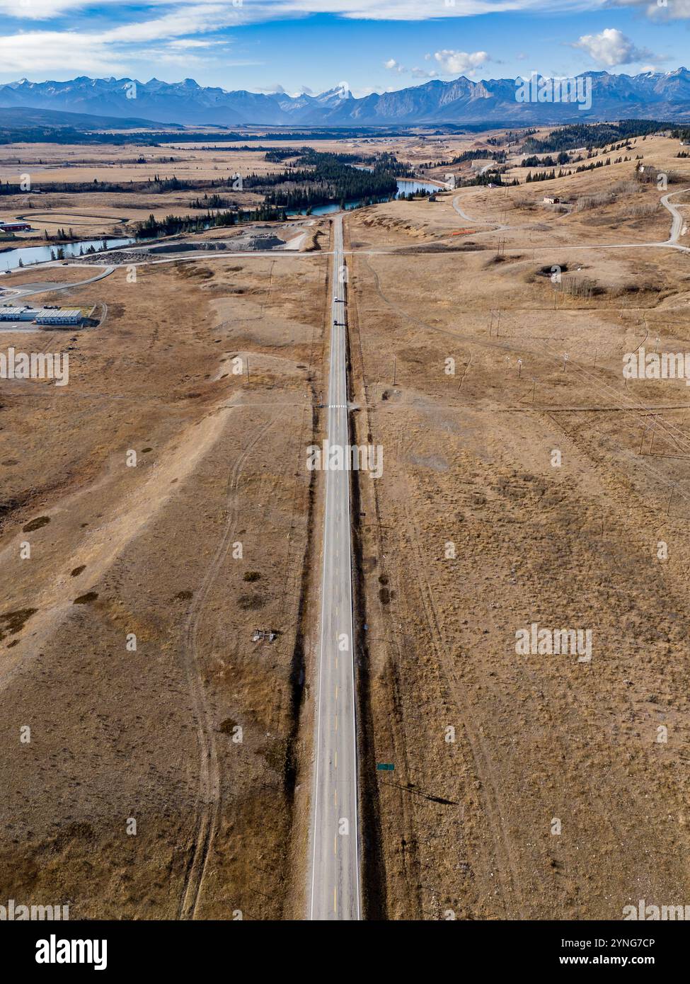 Aerial looking down shot straight roadway travelling towards Canadian ...