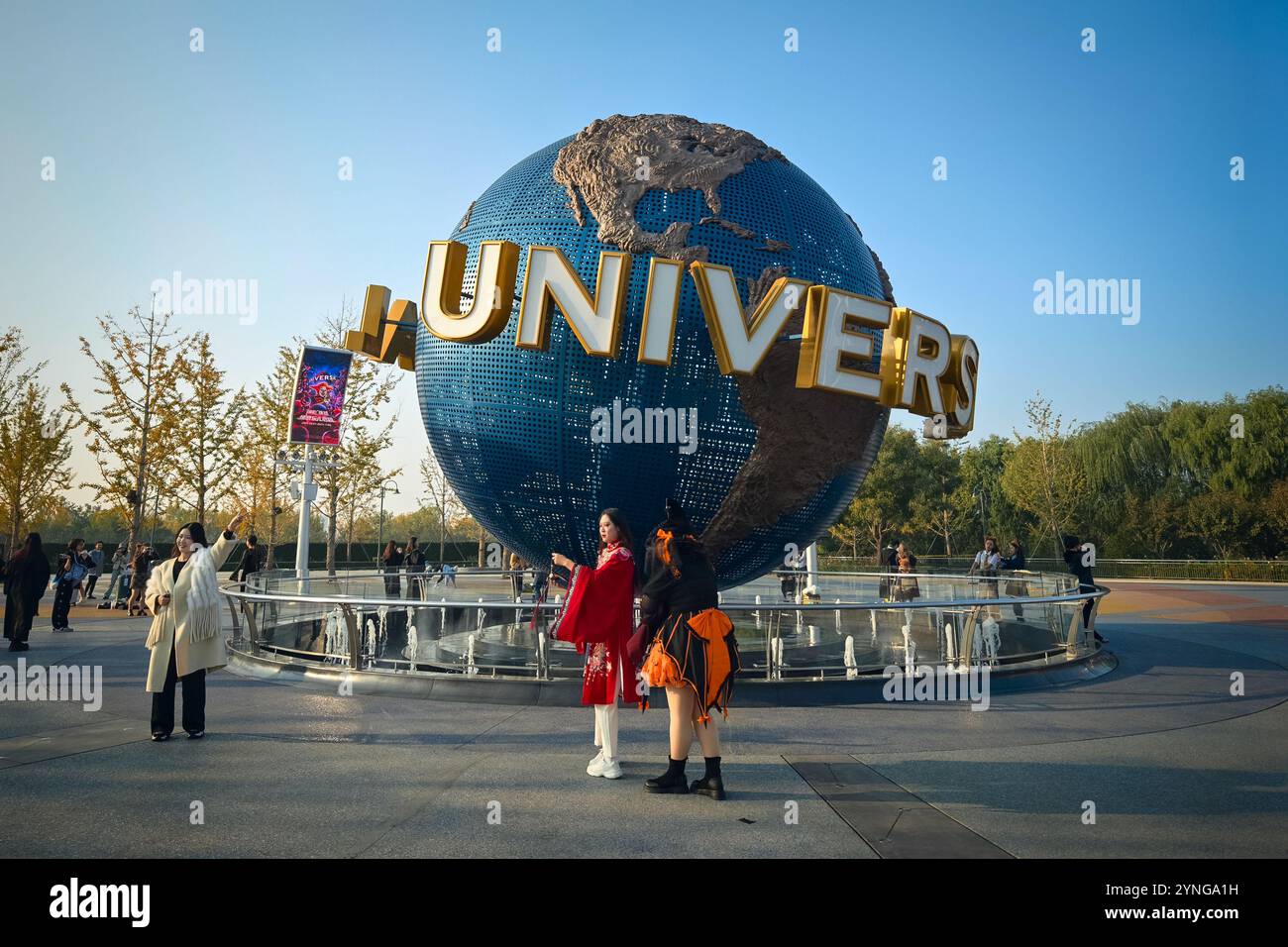 Beijing, China - Oct 24th, 2024: Tourists around the famous globe of ...