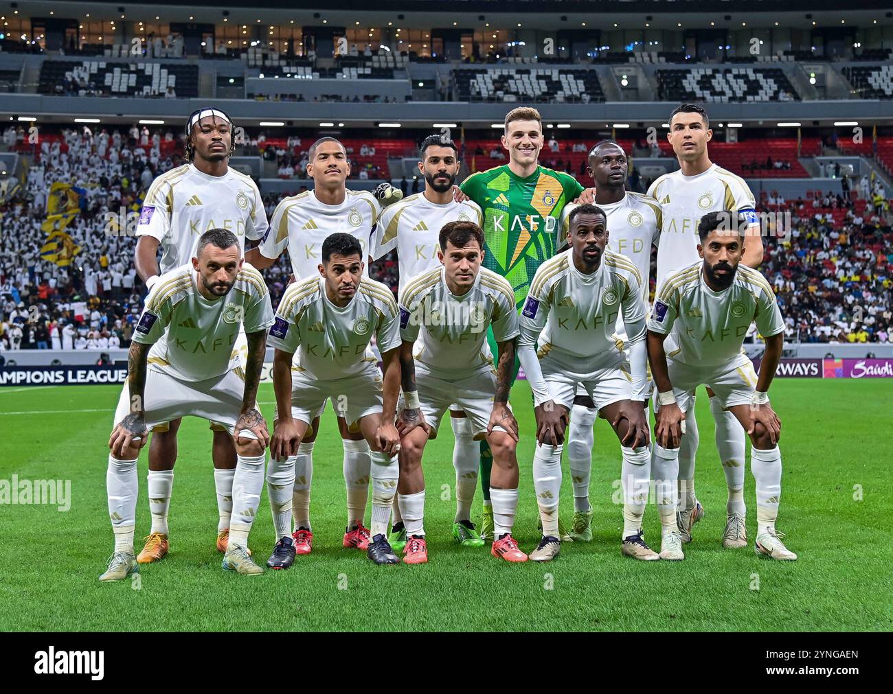 Al Khor, Qatar. 25th Nov, 2024. Players of Al Nassr FC pose for photos ...