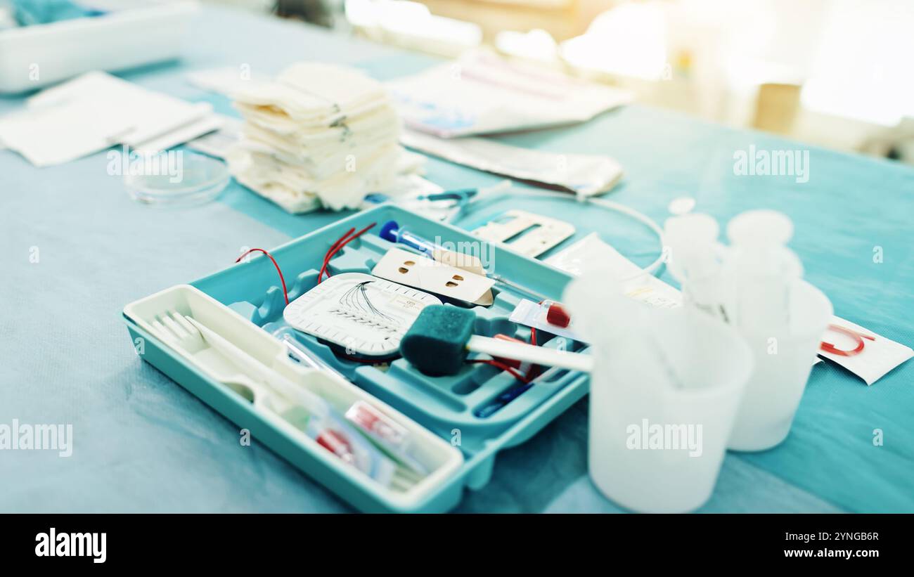 Medical tools, tray and desk at hospital for surgery, healthcare and ...