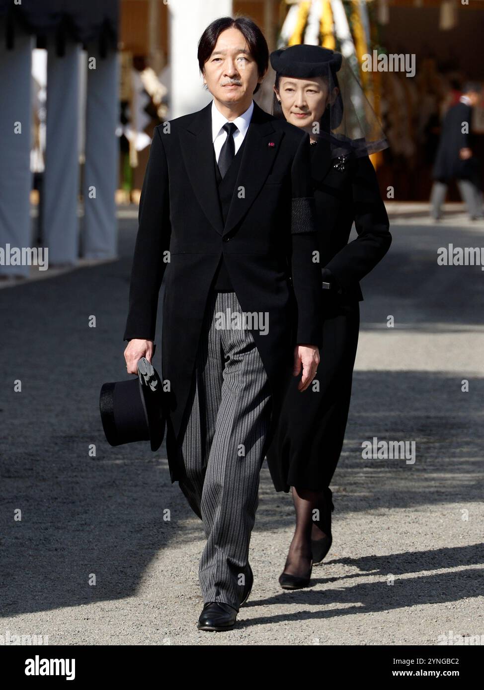 Japan's Crown Prince Akishino, left, and Crown Princess Kiko walk after ...