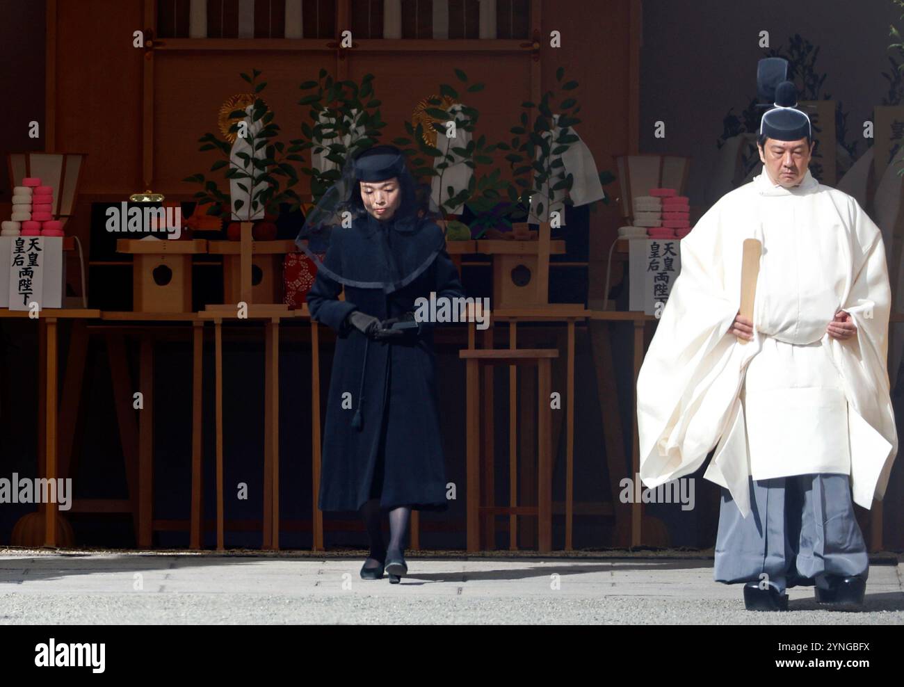Japan's Princess Akiko walks after attending a funeral service for ...