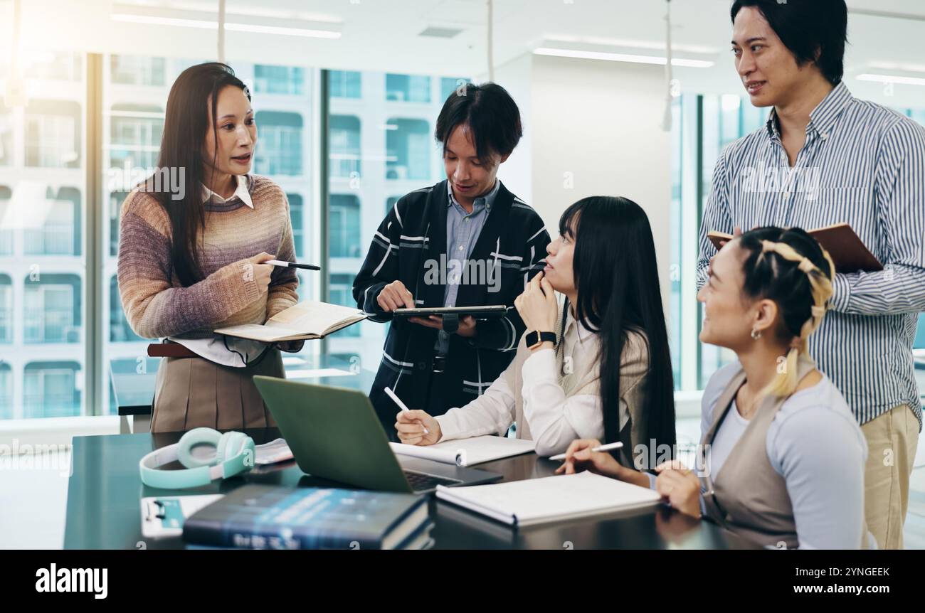 Japanese people, teamwork and laptop with brainstorming, collaboration ...