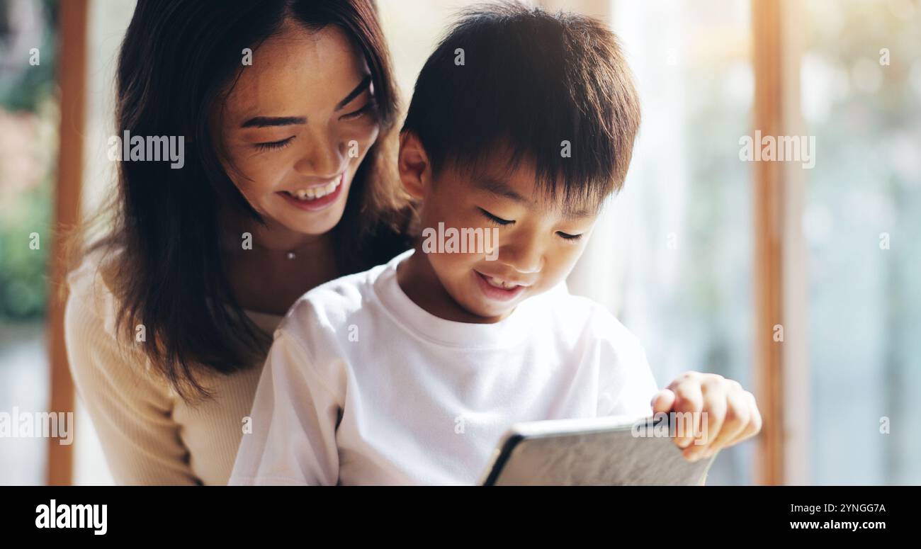Japanese child playing video games hi-res stock photography and images - Alamy