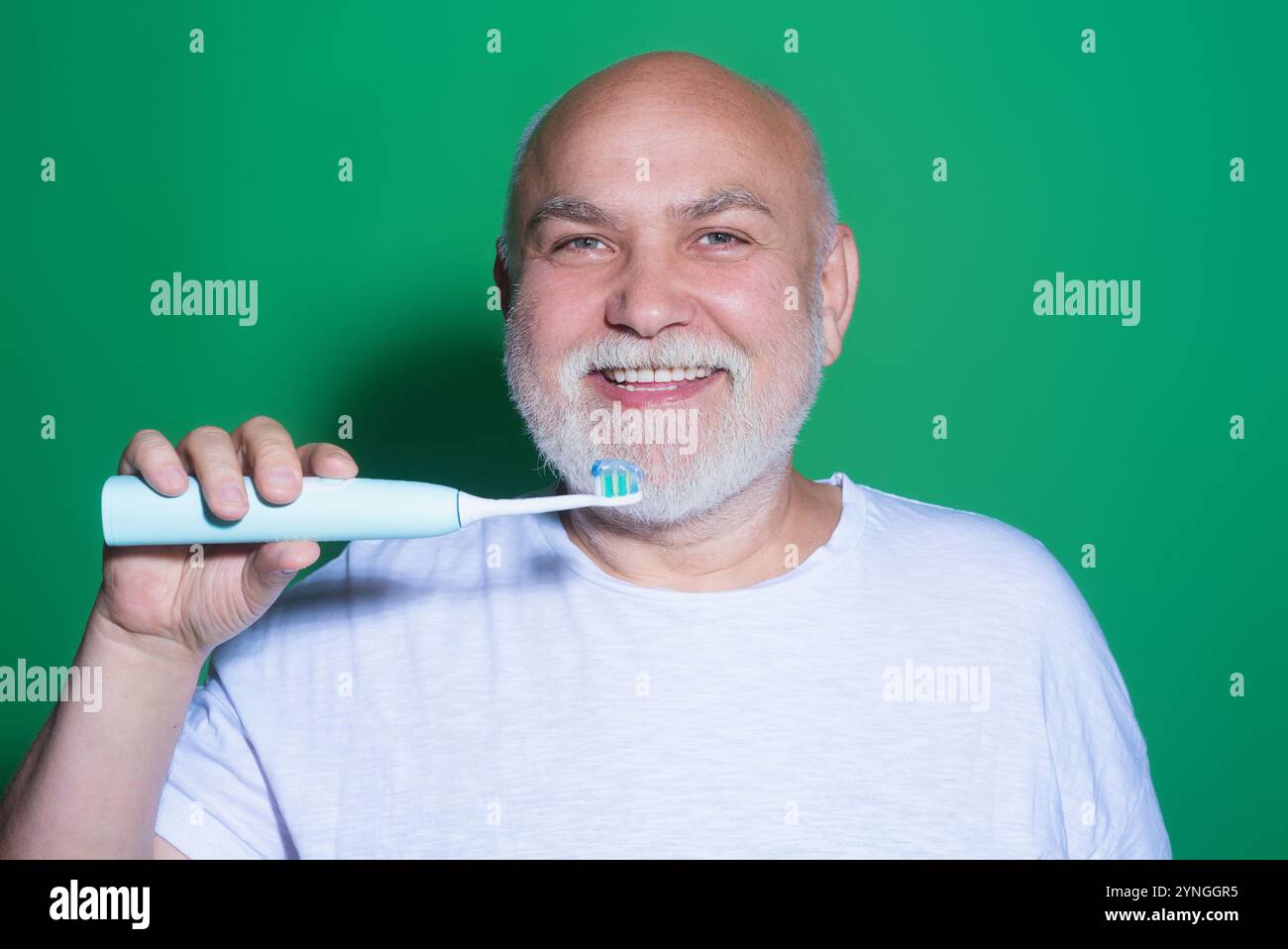 Brushing teeth. Senior holding toothbrush for tooth brushing. Dentistry ...
