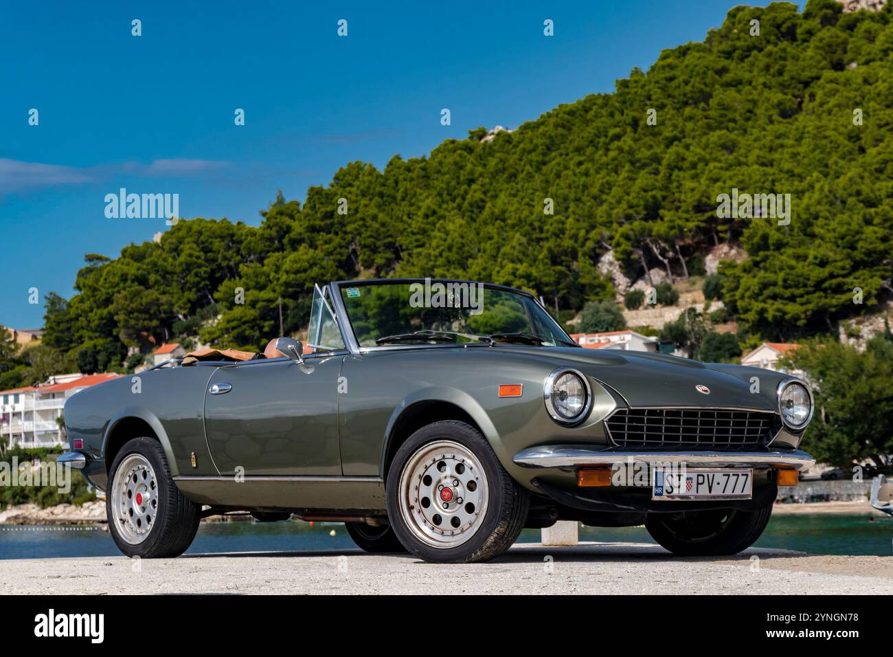 Legendary classical Fiat Spyder on the road. One of the longest-lived ...