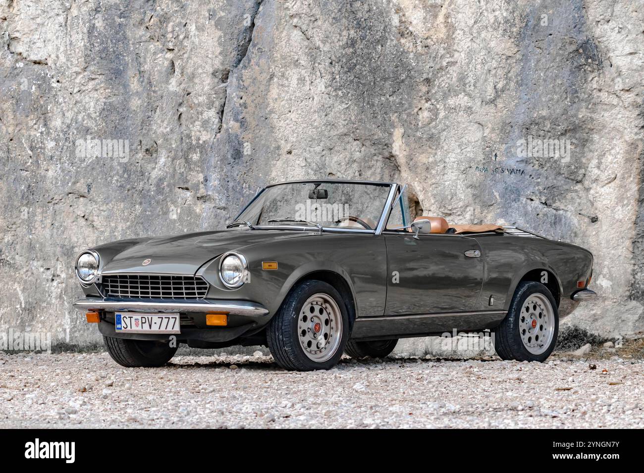 Legendary classical Fiat Spyder on the road. One of the longest-lived ...