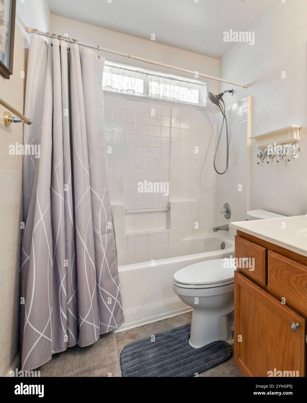 Fresh and inviting bathroom with modern design and natural light source ...