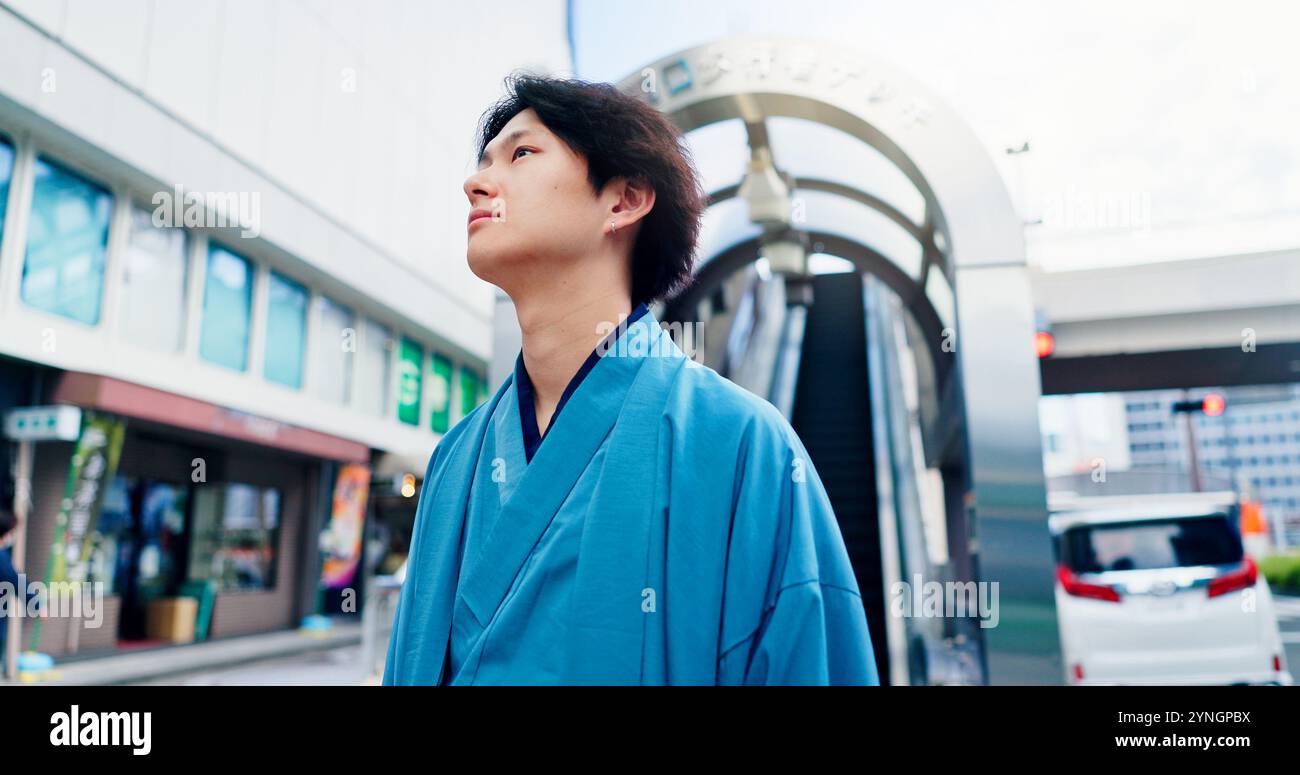 Man, thinking and metro journey with traditional clothes, outfit and ...