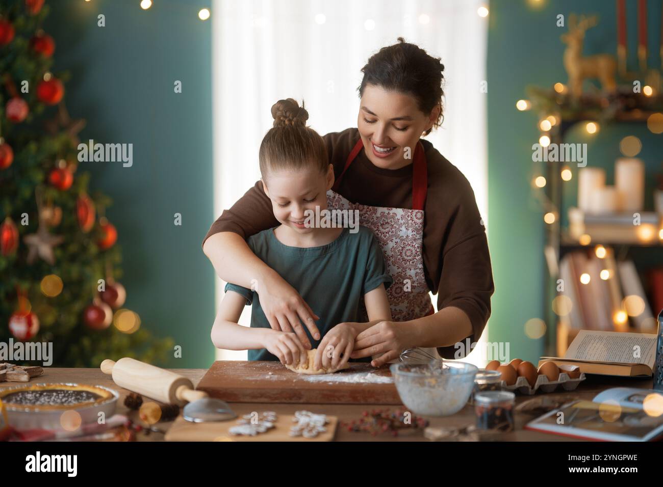 Merry Christmas and Happy Holidays. Family preparation holiday food ...