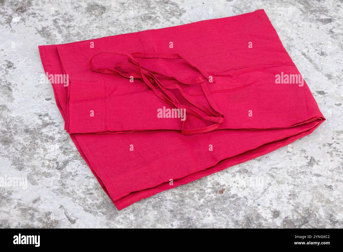 A new red petticoat and ribbon lay folded on the floor. Petticoats are ...