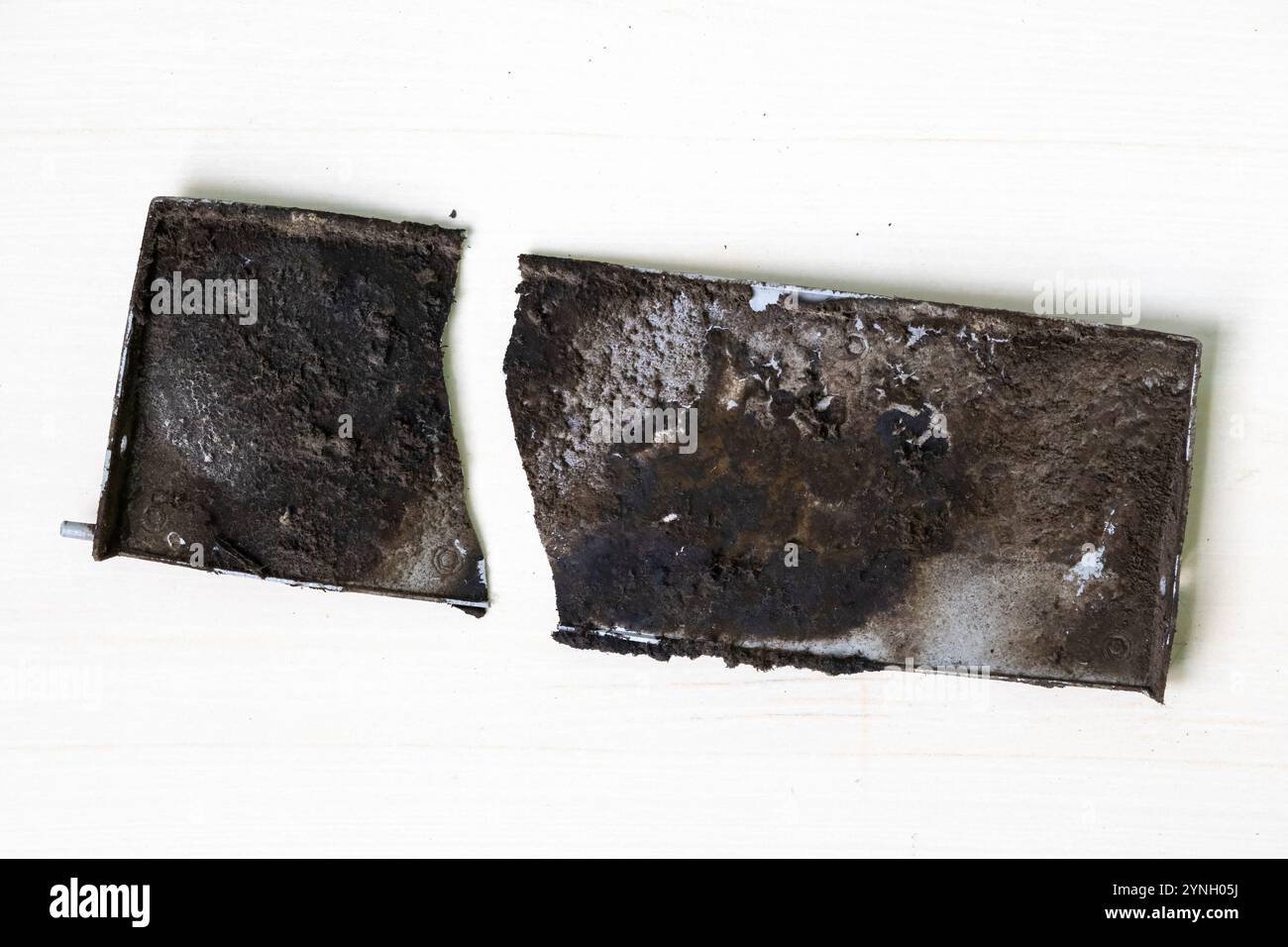 Dirty, oily, broken parts of an old kitchen exhaust fan Stock Photo - Alamy