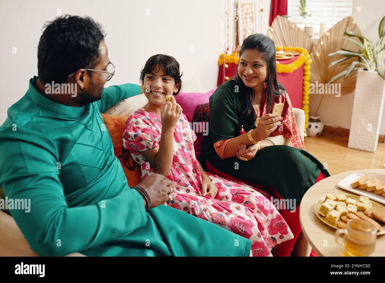 Celebrating Family Moments While Sharing Snacks Together Stock Photo ...