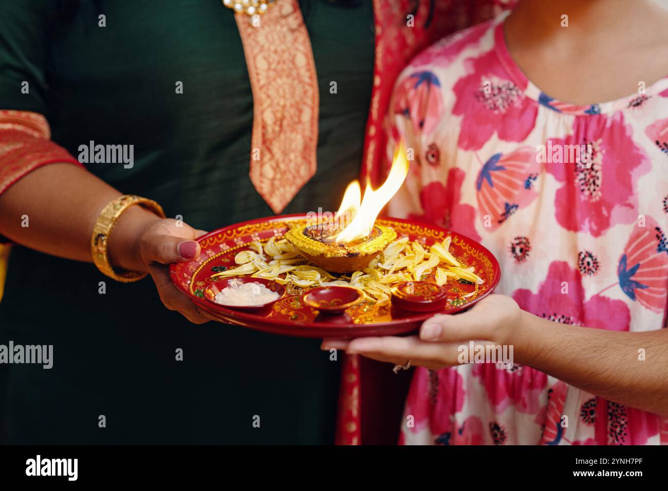 Celebrating Indian Festival with Traditional Rituals Stock Photo - Alamy