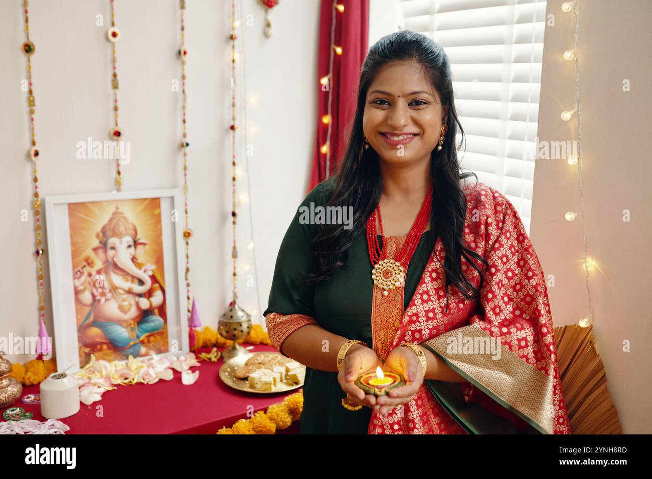 Portrait indian family celebrating diwali hi-res stock photography and ...