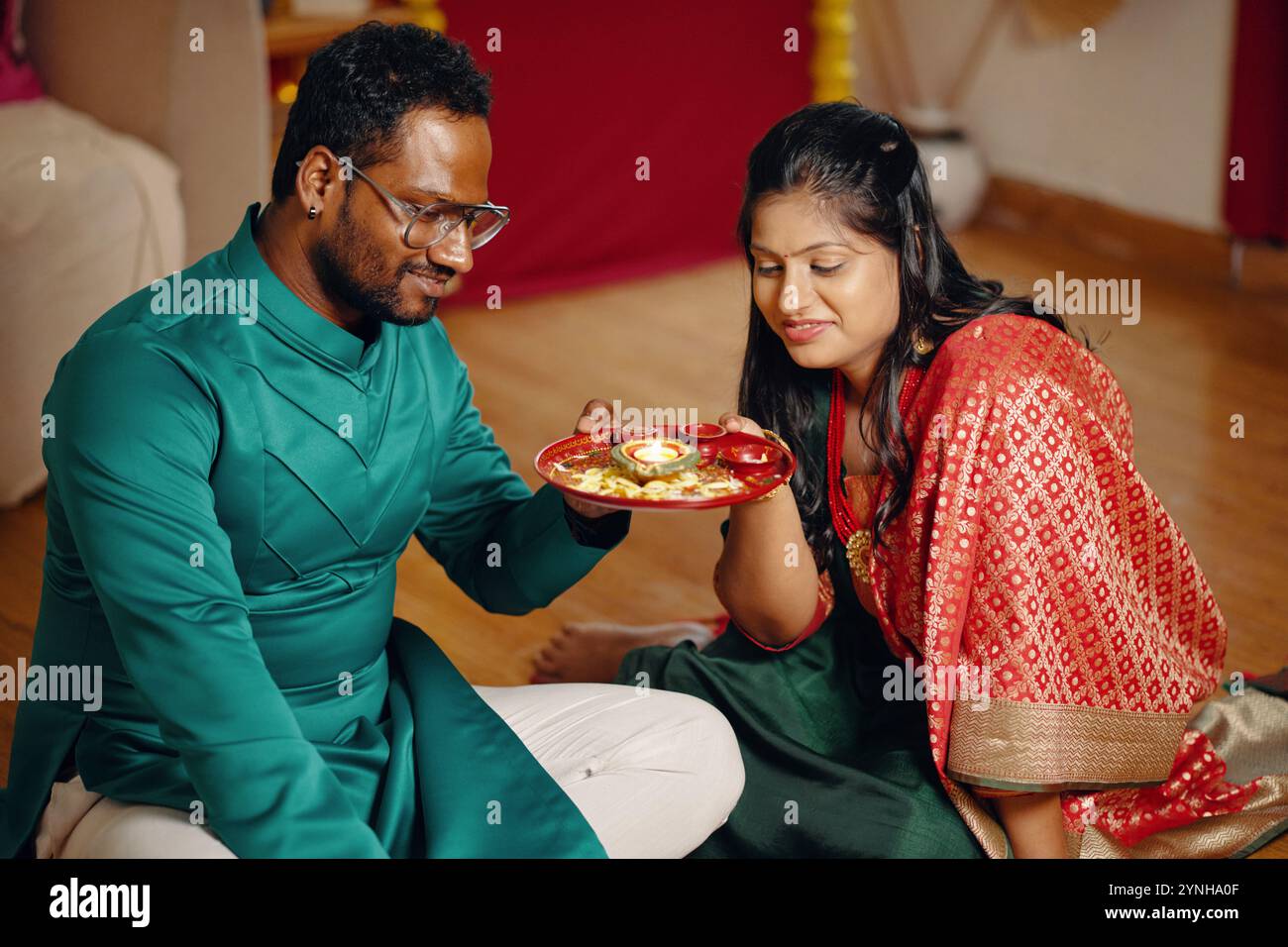Celebrating Traditional Festivity in Beautiful Attire Stock Photo - Alamy