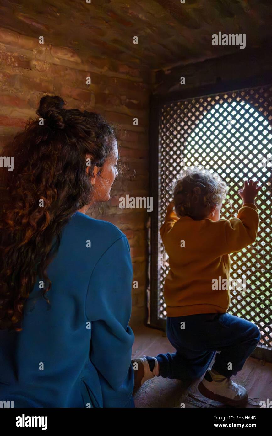 Mother and Toddler Inside the Keep of an Ancient Muslim Fortress at ...