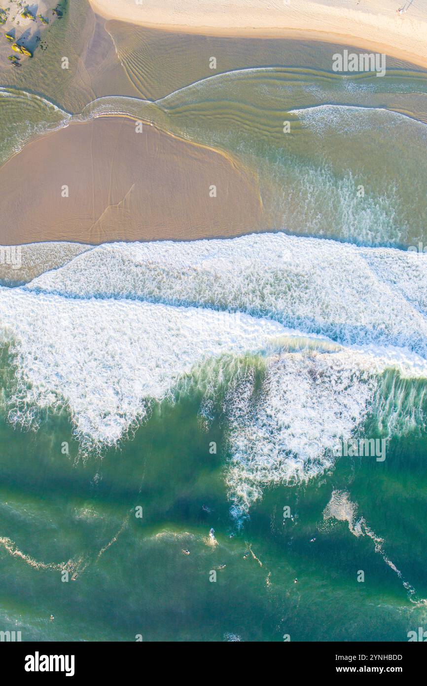 top view of the shore of a beach at sunrise, aerial photography with ...