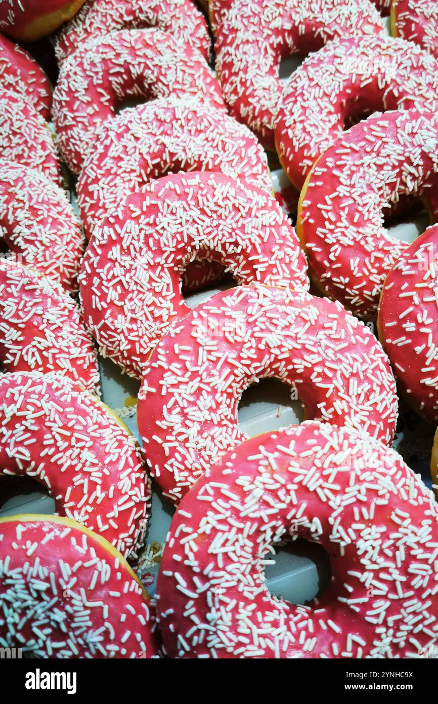 pink donuts texture as very nice food background Stock Photo - Alamy
