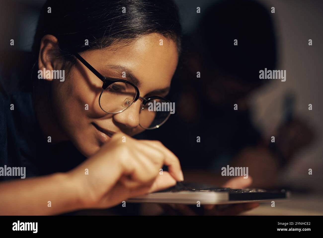 Woman, electronics and technician on motherboard at night, repair ...