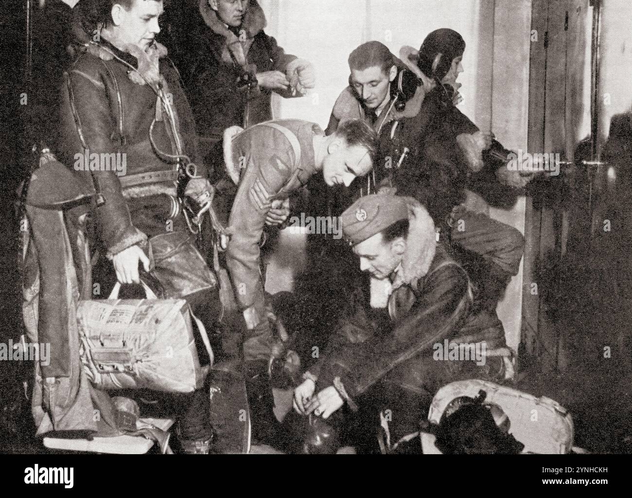 A bomber crew preparing for a raid on Germany during WWII. From Wings ...