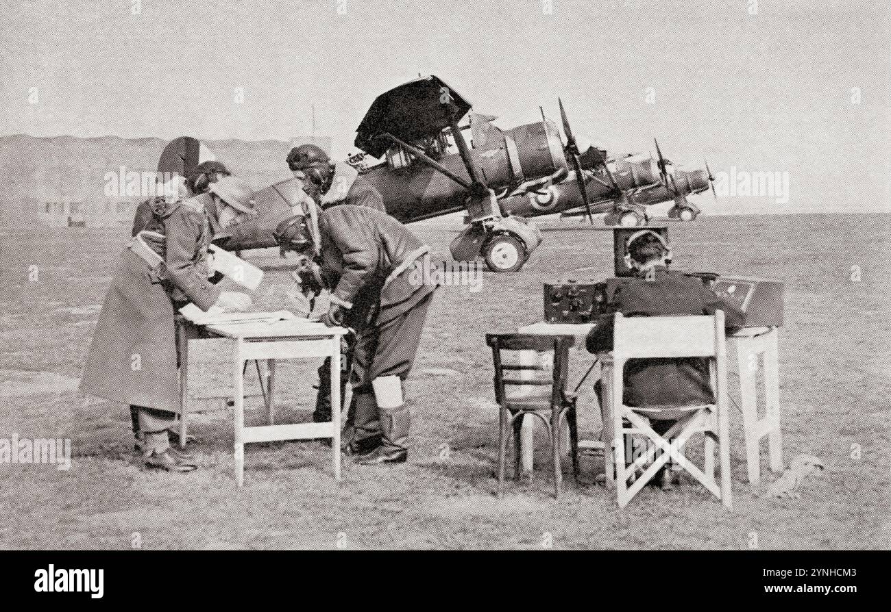 Pilots of a Canadian army co-operation squadron being briefed during a ...