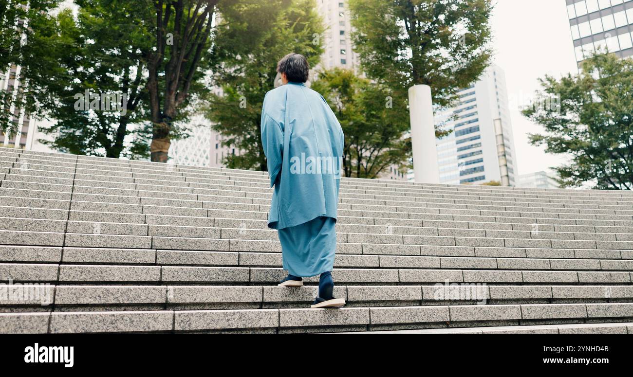 Japanese man, back and steps with traditional clothes, outfit and ...