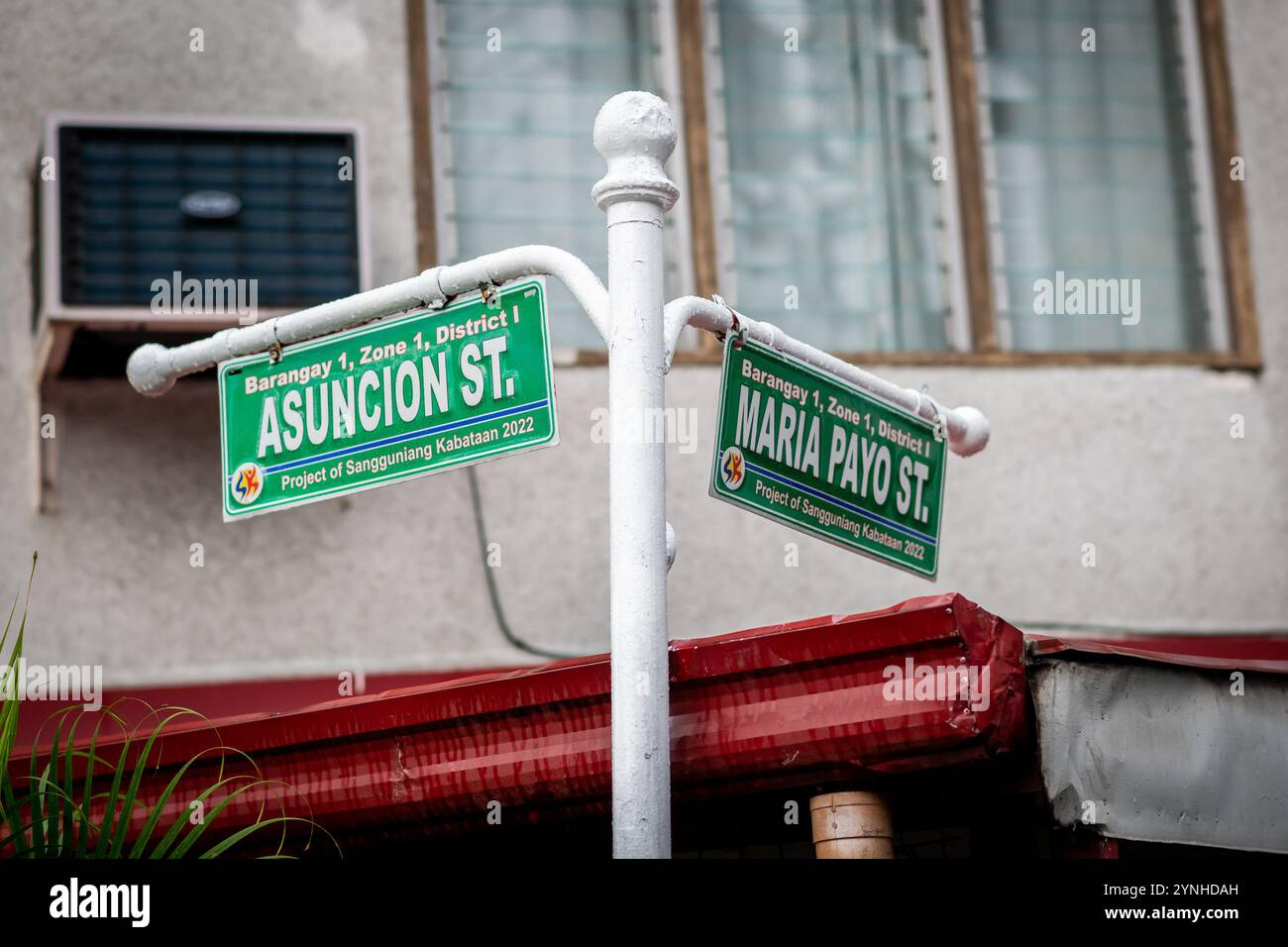 Street sign at the corner of Asuncion St. and Maria Payo St. in the ...