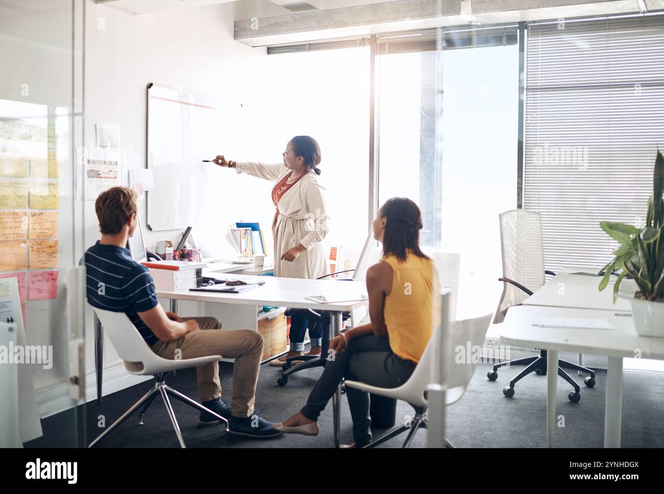 Creative, meeting and group in office, brainstorming and discussion for ...