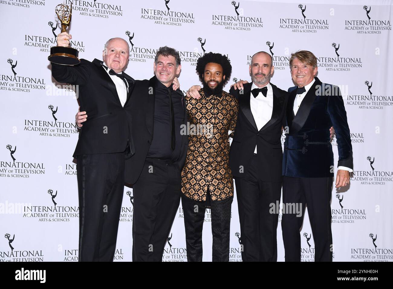Producer Neil Duncanson (2L), Denim Richards and Simon Hammerson (2R ...