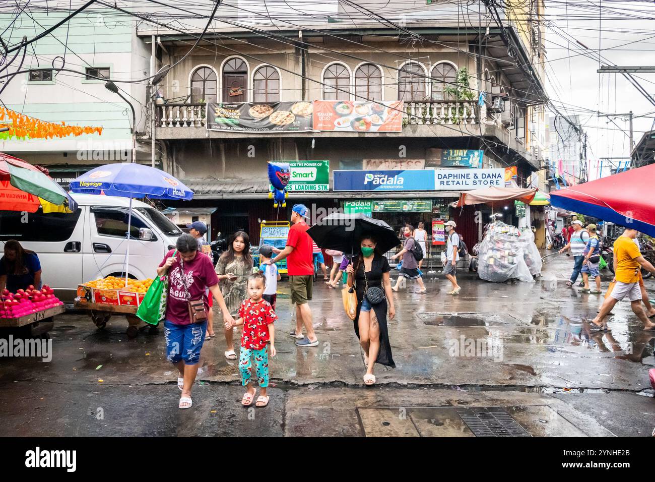 A typical busy street scene in the Tondo district of Metro Manila, The Philippines Stock Photo ...
