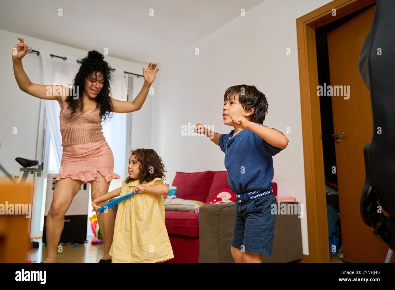 Family dancing at home mother father child hi-res stock photography and ...