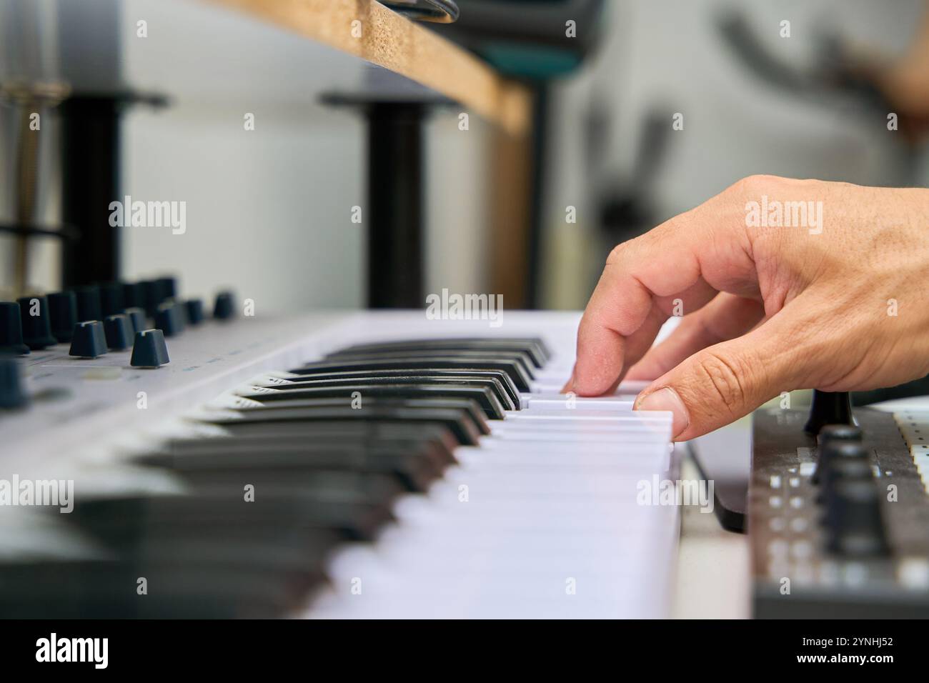 detail of a composer's hands playing the piano Stock Photo - Alamy