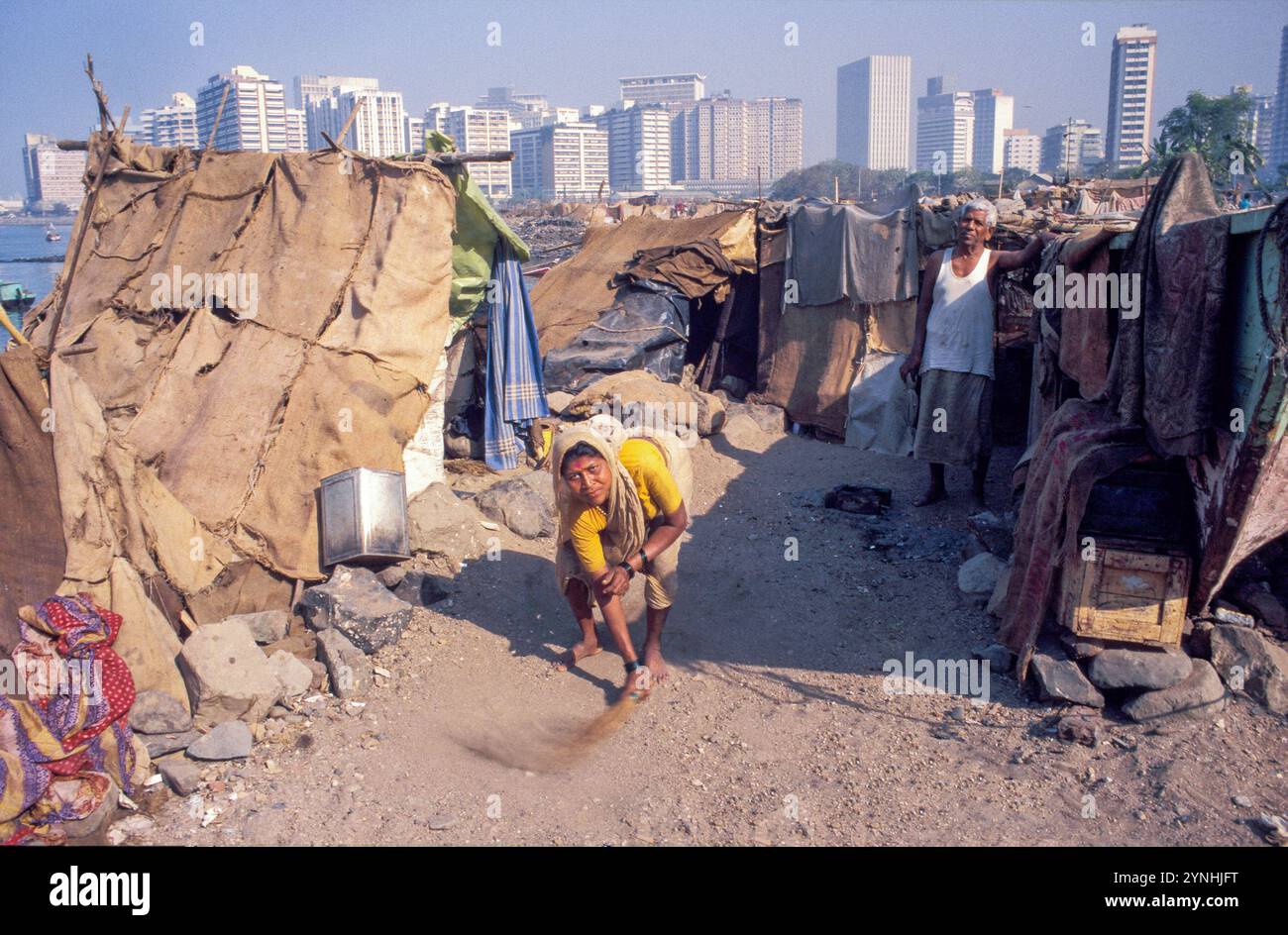 India, Bombay, Slum along the harbor. Fisherman families have their ...