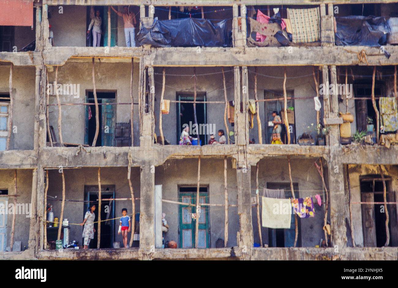 India, Bombay, people are already living in an unfinished apartment ...