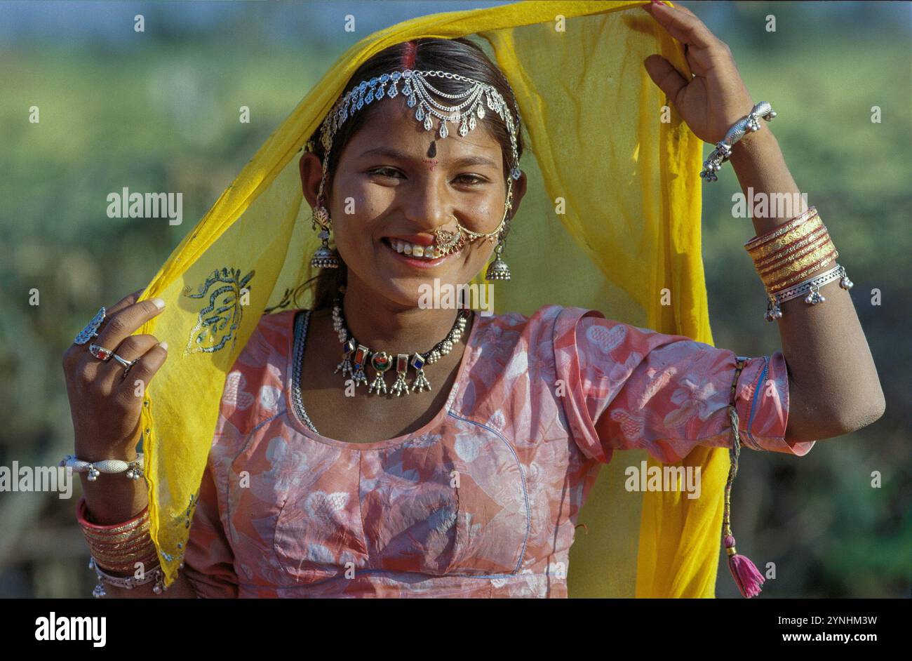 India, Rajasthan, woman with traditional jewelry in her nose, ears and ...