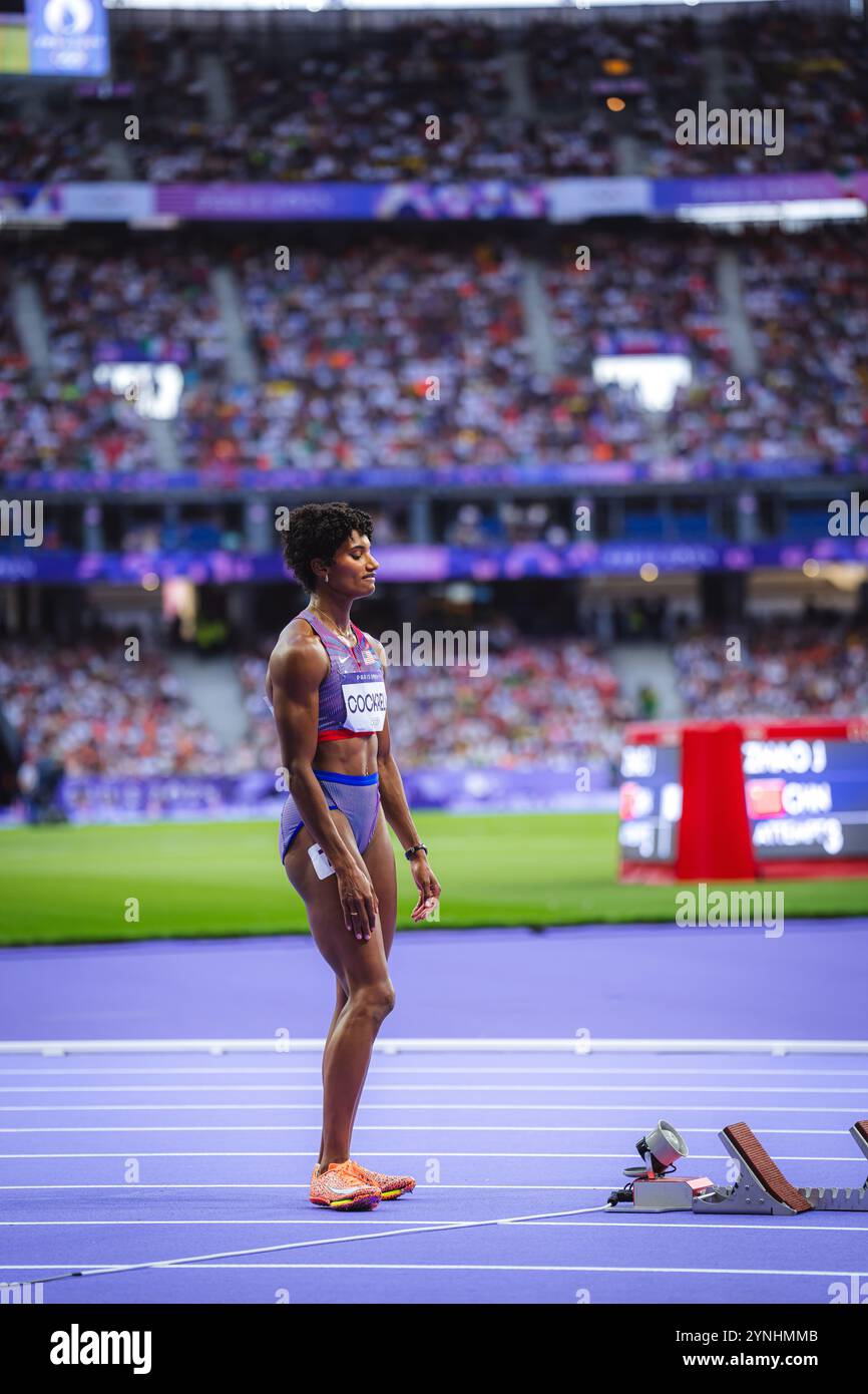 Anna Cockrell participating in the 400 meters hurdles at the Paris 2024 ...
