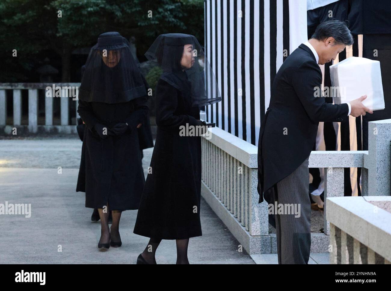 Japanese Princess Akiko Mikasa serves as chief mourner during the Grave ...