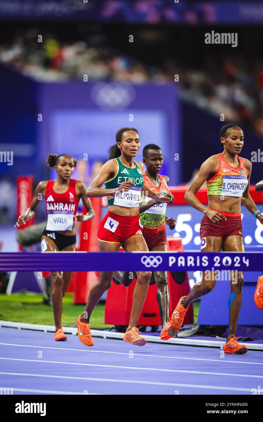 Sembo Almayew participating in the 3000 metres steeplechase at the ...