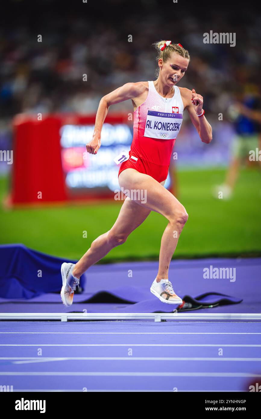Alicja Konieczek participating in the 3000 metres steeplechase at the Paris 2024 Olympic Games ...