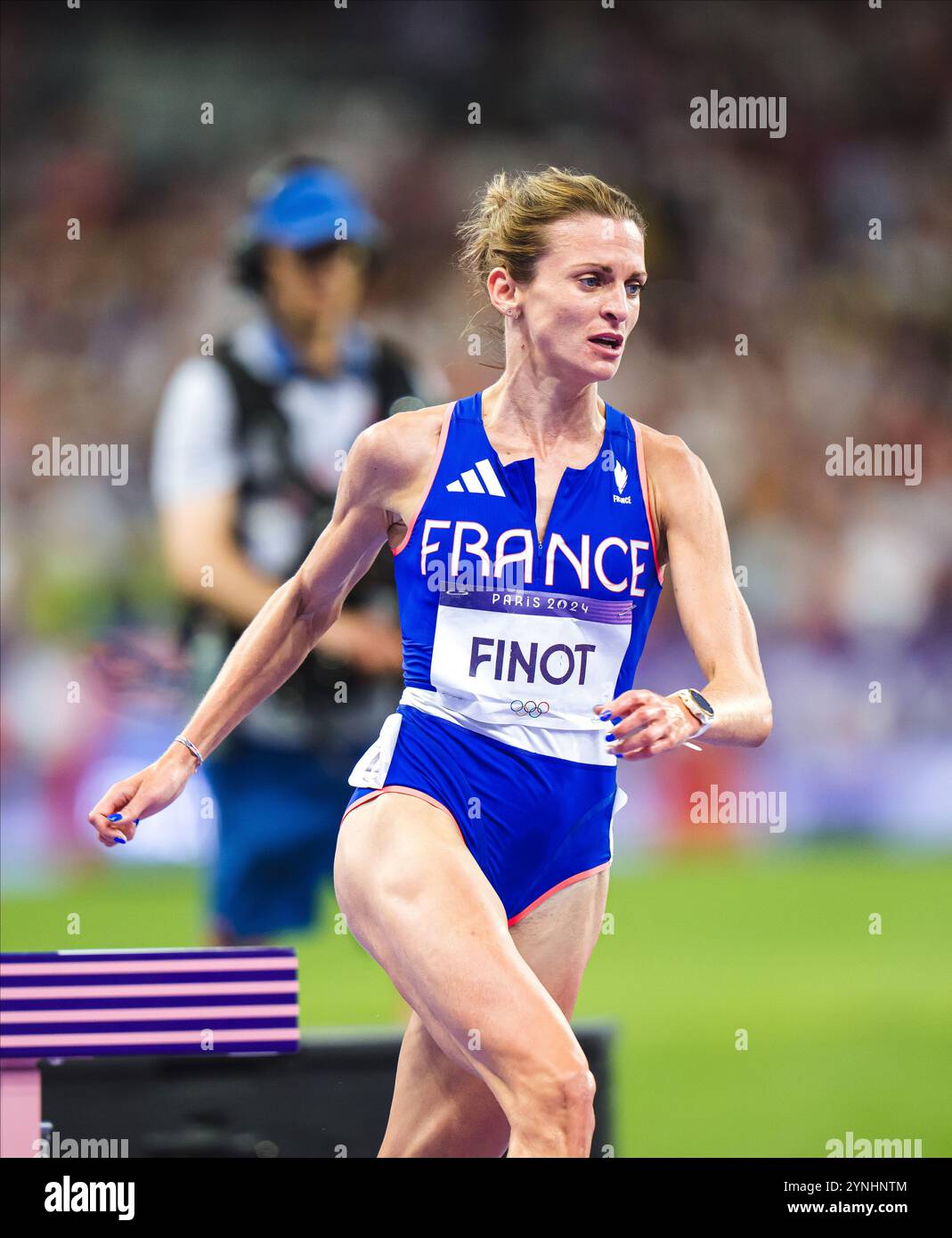 Alice Finot participating in the 3000 metres steeplechase at the Paris ...